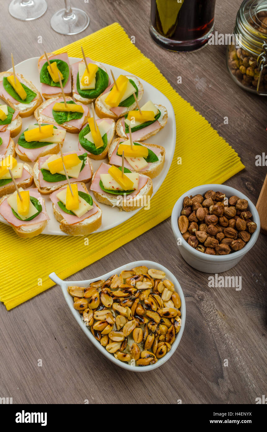 New Year's Eve meal - canapes with ham, cheese and spinach leaves ...