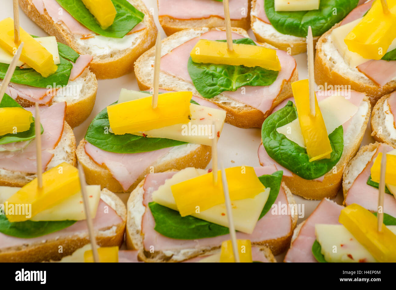 New Year's Eve meal - canapes with ham, cheese and spinach leaves ...