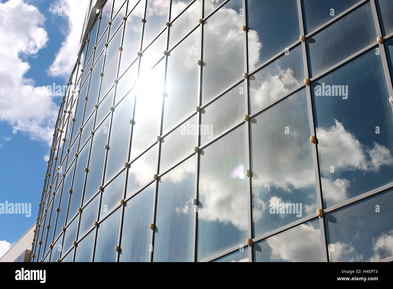 the sun and the sky in glass building Stock Photo - Alamy