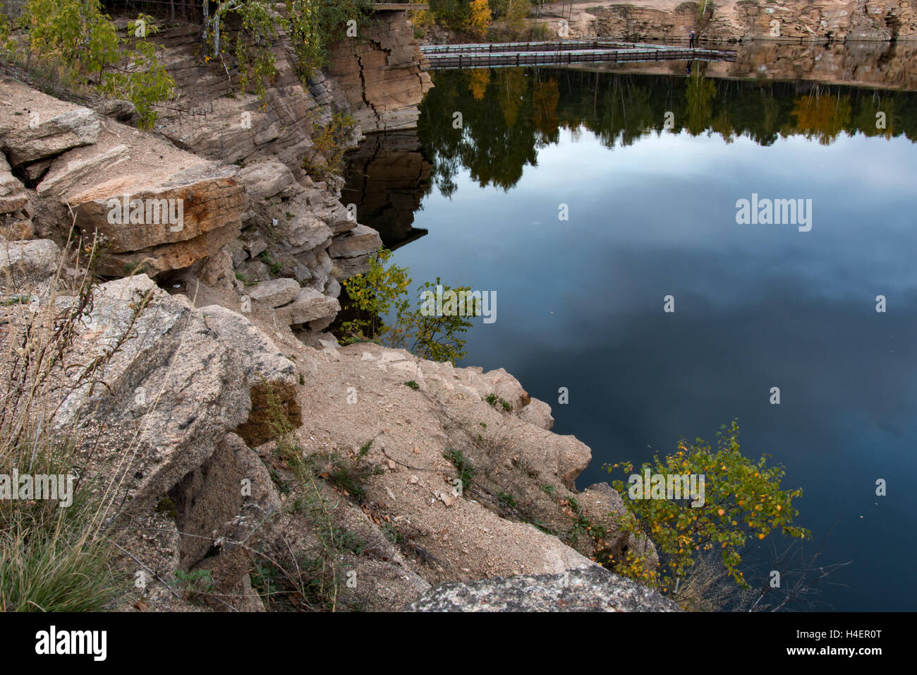 stone cliff surrounds the lake shore Fall Stock Photo - Alamy