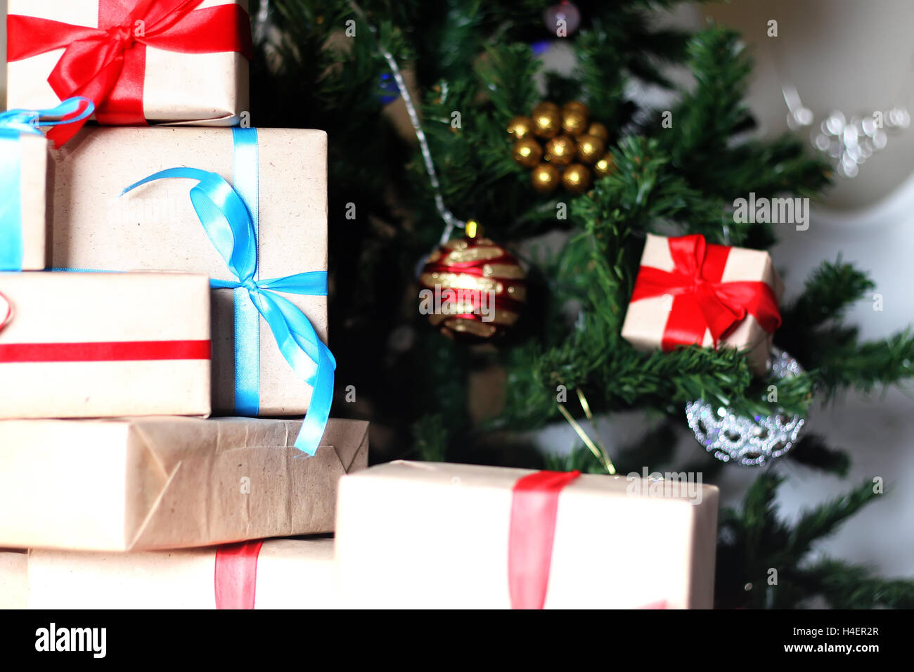 gift under tree christmas ball Stock Photo - Alamy