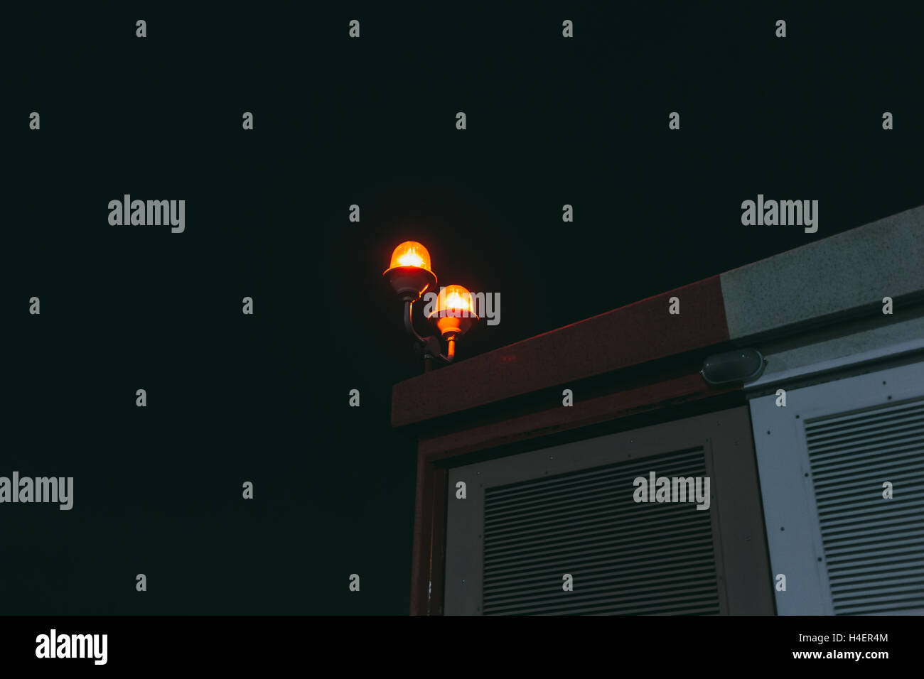 red marker lights on the building Stock Photo - Alamy