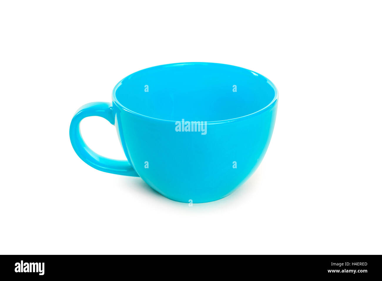 Blue cup isolated on white background. Close-up Stock Photo - Alamy