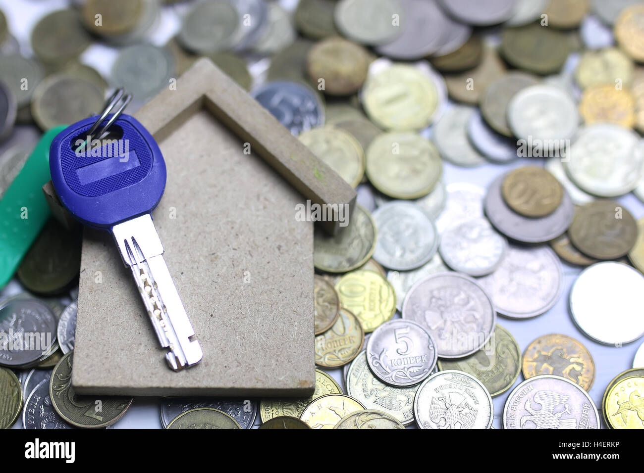 key and russian coins on background Stock Photo - Alamy