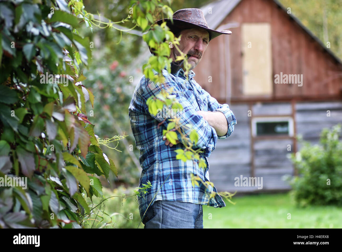 cowboy man smoke pipe Stock Photo - Alamy