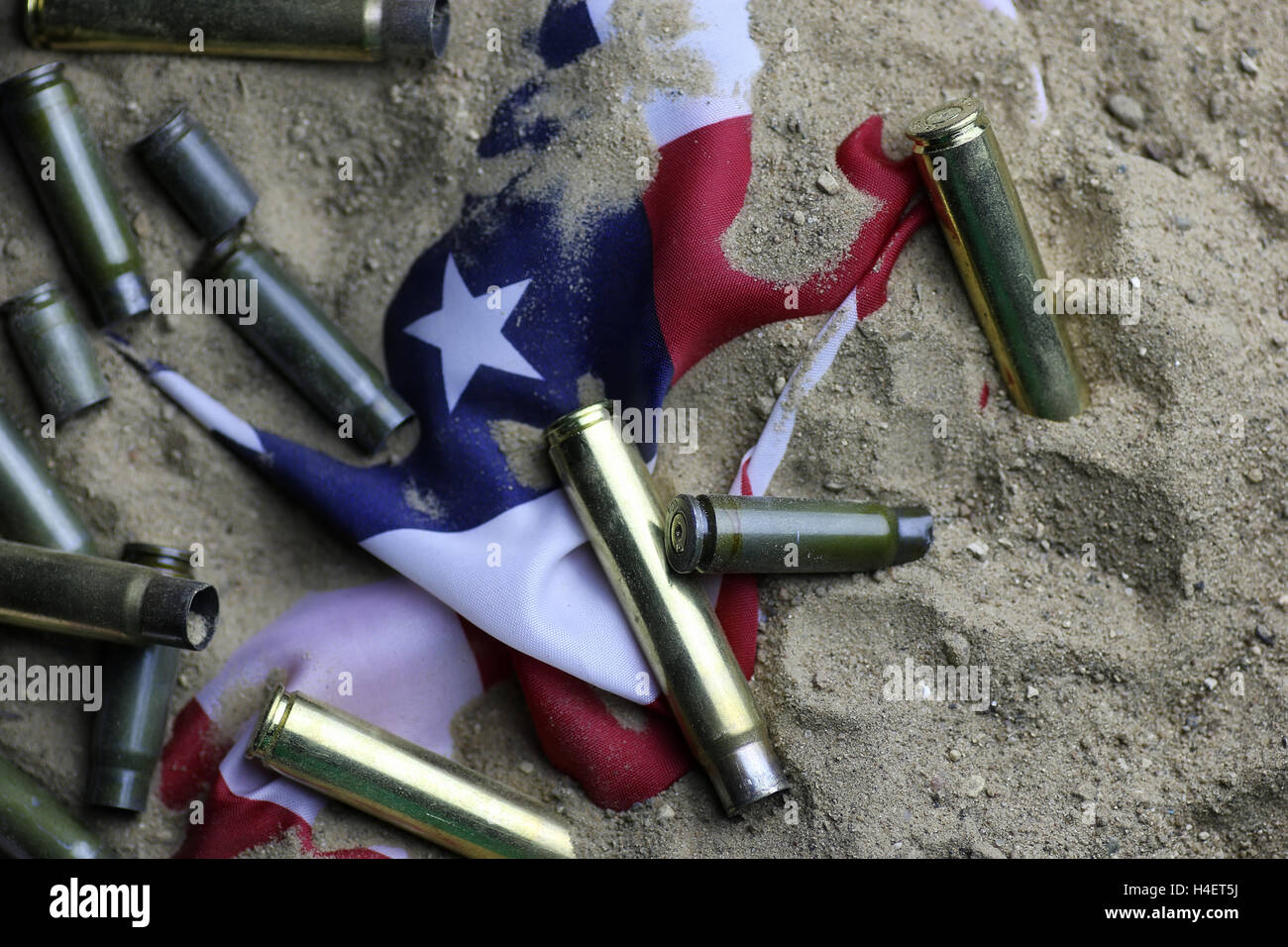 bullet and usa flag in sand war Stock Photo - Alamy