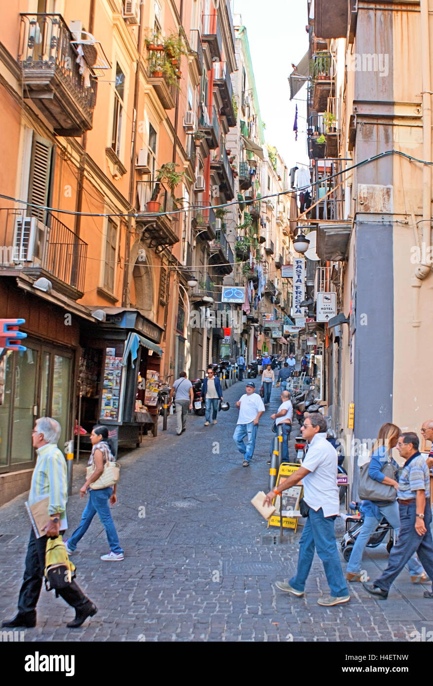 The narrow busy street of the Spanish Quarters (Quartieri Spagnoli ...
