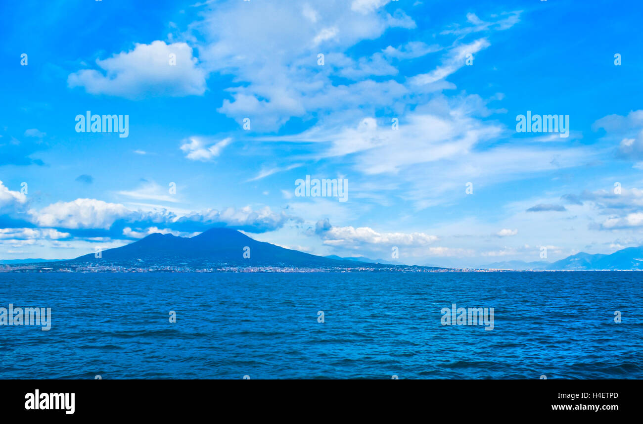 The scenic view on the Mount Vesuvius with the top, hidden in clouds ...