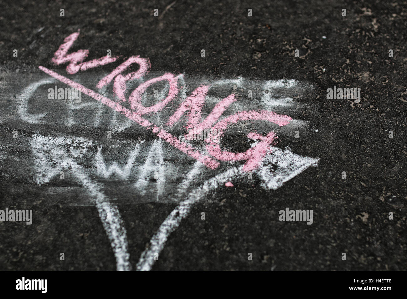 Arrow asphalt chalk drawing pavement hi-res stock photography and ...