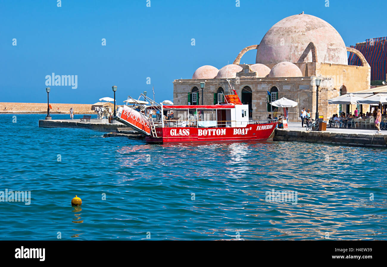 The red tourist boat near Hasan Pasha Mosque waits for departure ...