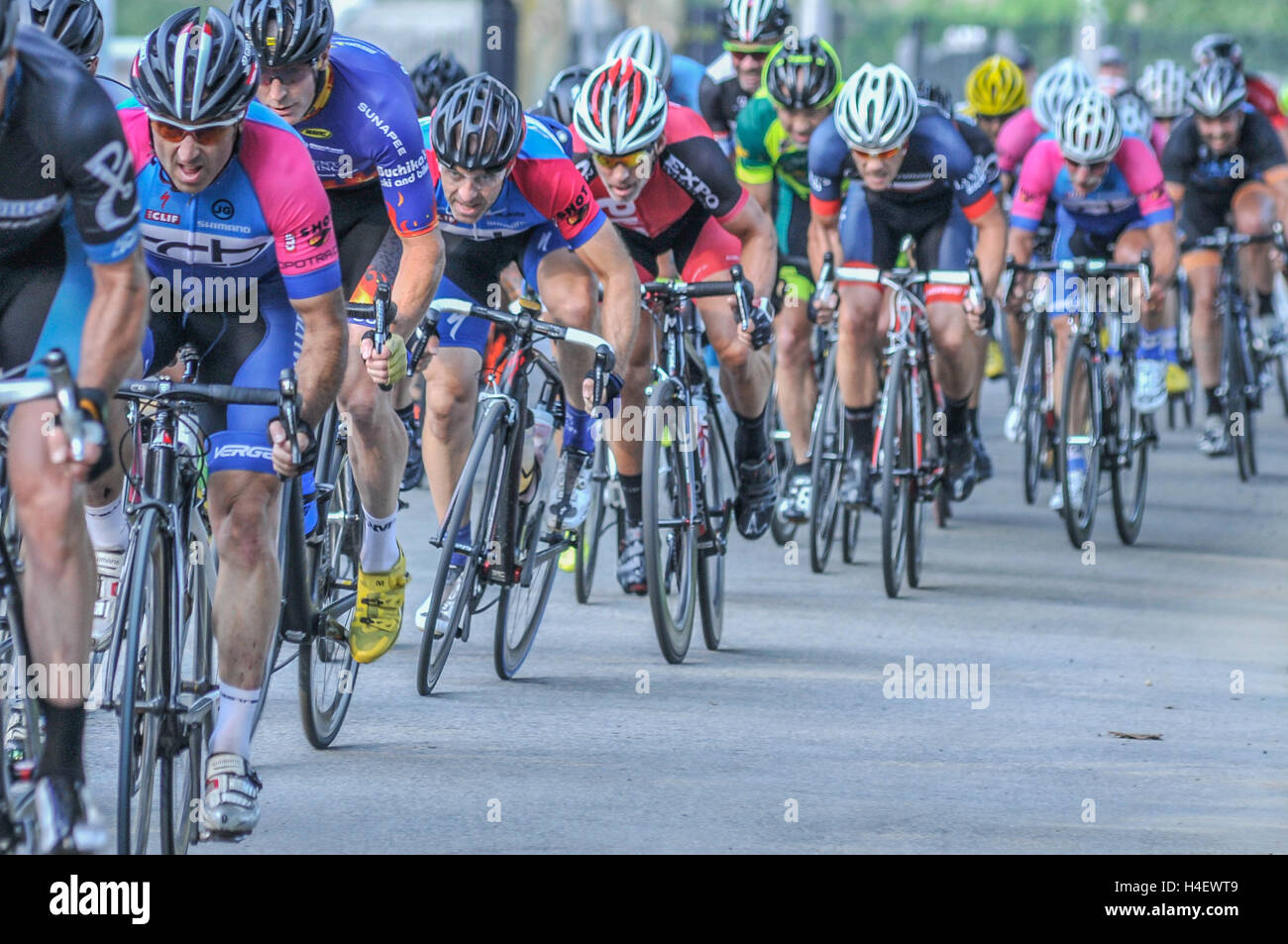 Bike racers accelerate in hard effort after making tight turn in annual ...