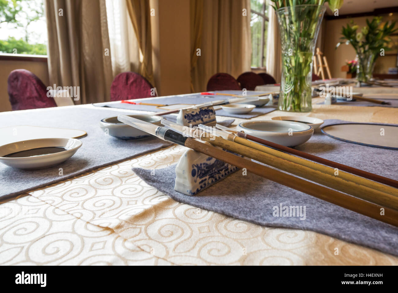 chinese calligraphy tools on table Stock Photo - Alamy