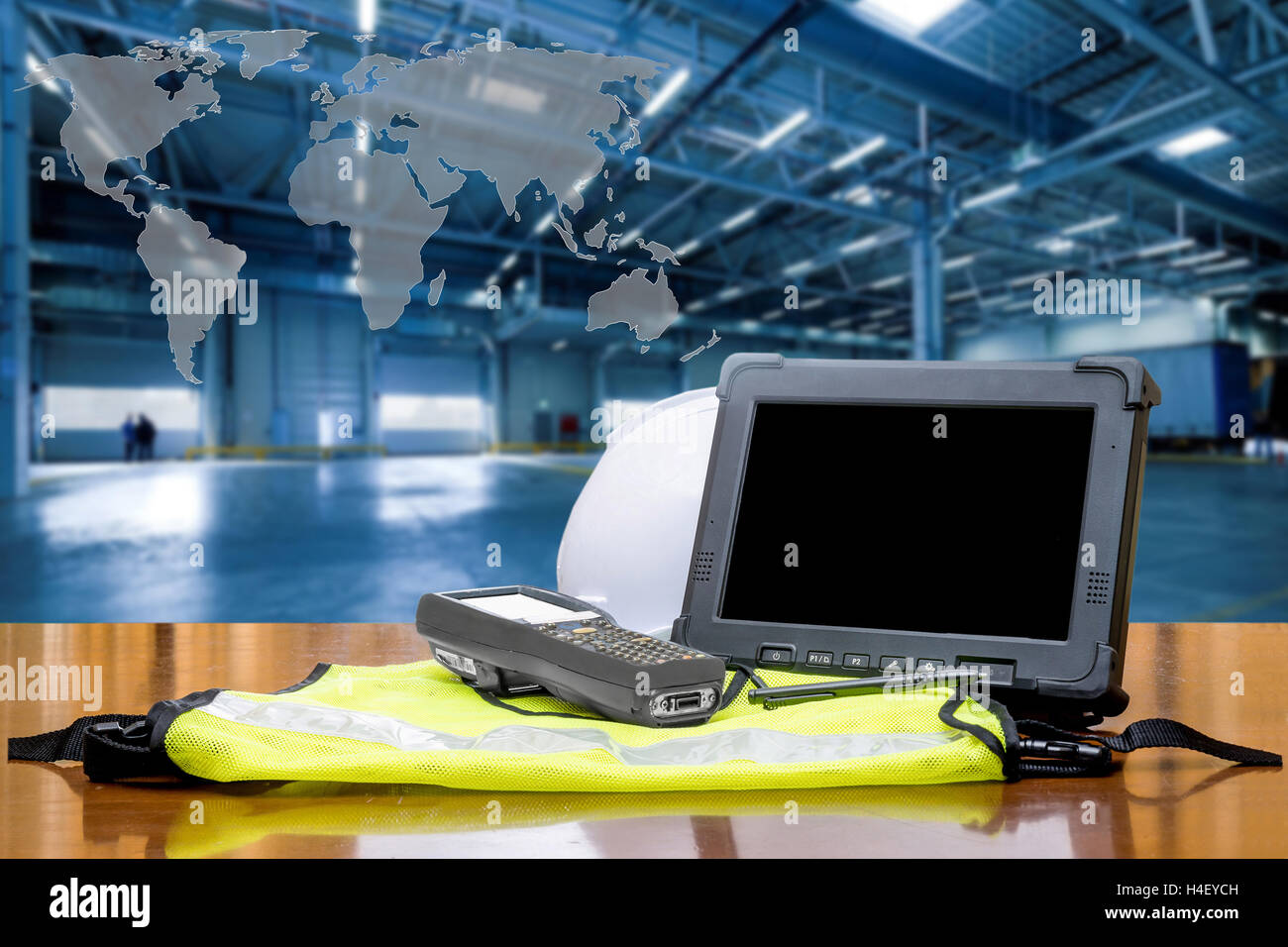 Rugged computers tablet and Bluetooth barcode scanner in front of ...