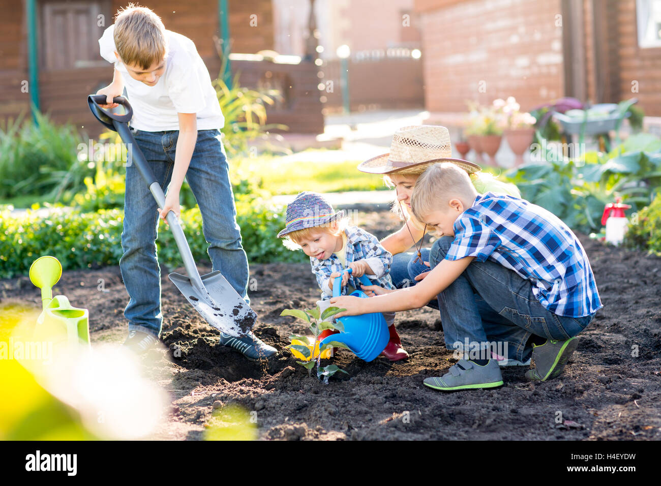 Children planting tree hi-res stock photography and images - Alamy