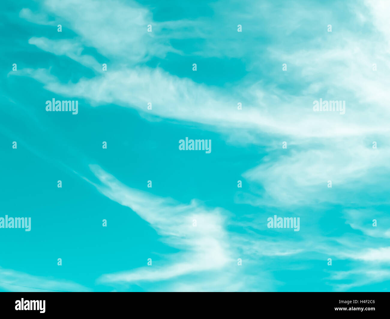 Soft cloud moving by wind and light blue sky background Stock Photo - Alamy