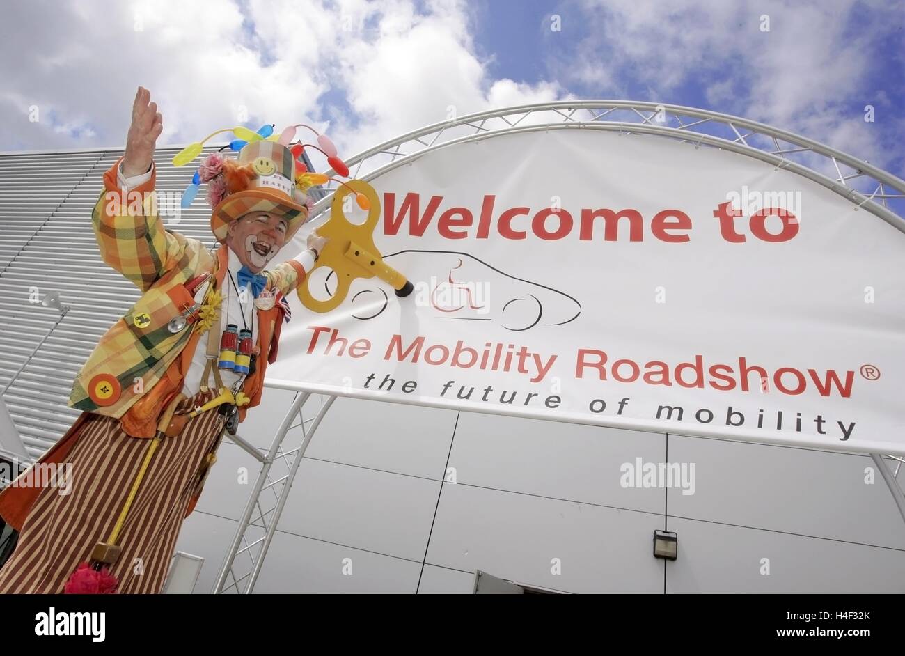 A clown outside the Mobility Roadshow, mobility choice, sales of ...