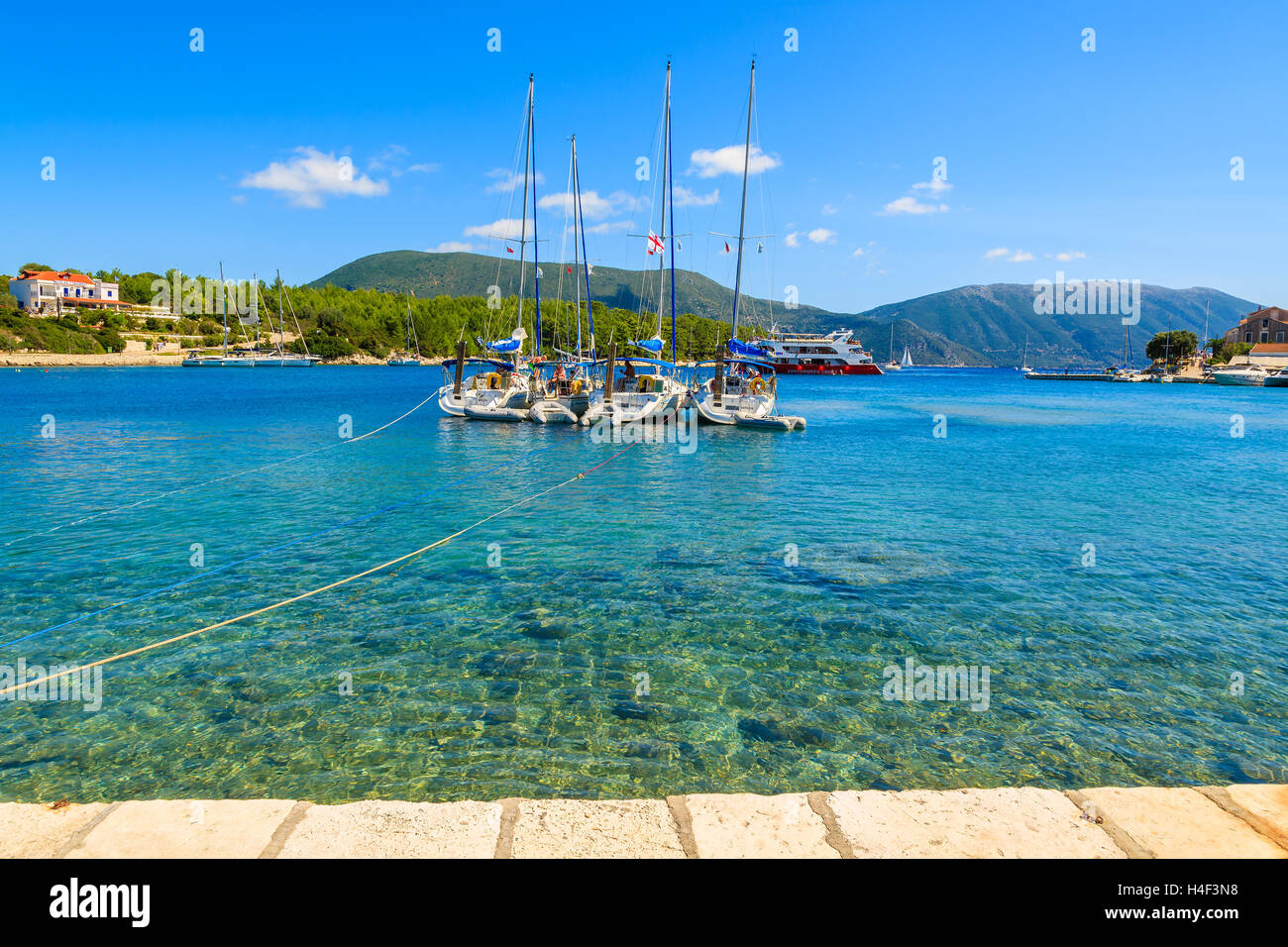 FISKARDO PORT, KEFALONIA ISLAND, GREECE - SEP 16, 2014: Yacht boats in ...
