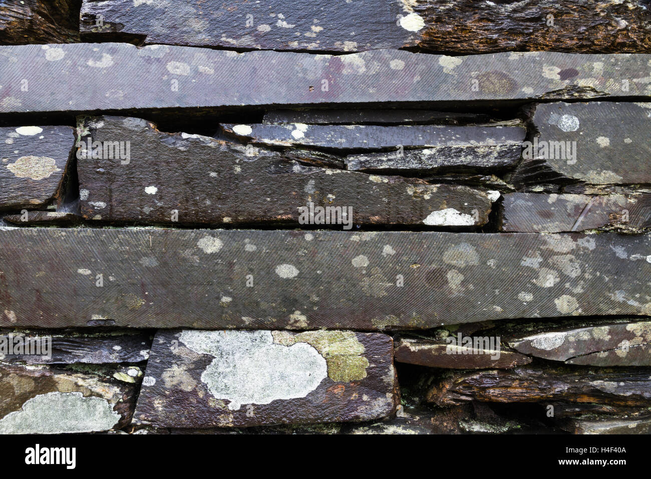 Old weathered dry stone slate wall making background texture Stock ...