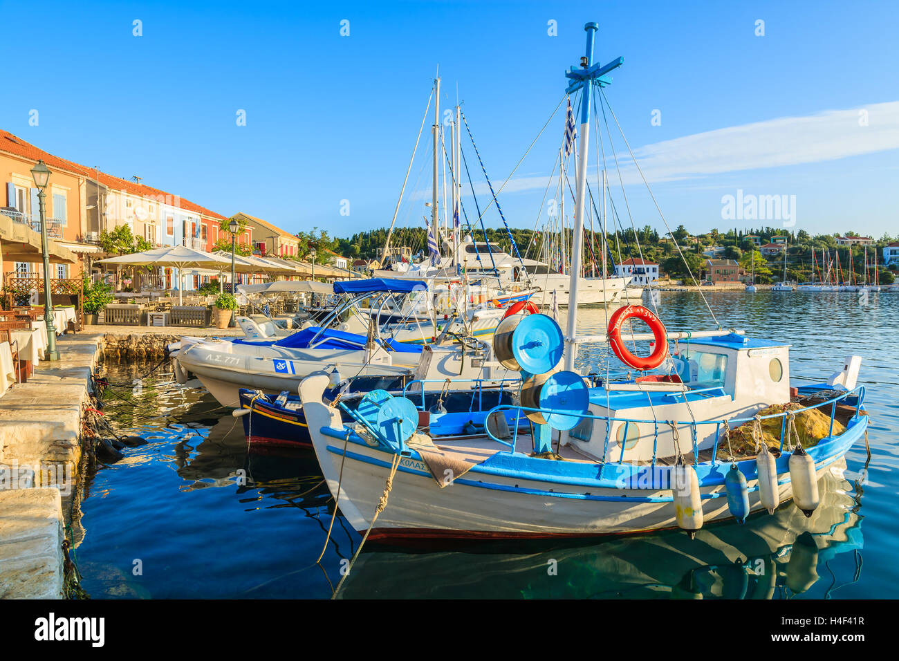 FISKARDO PORT, KEFALONIA ISLAND, GREECE - SEP 18, 2014: traditional ...