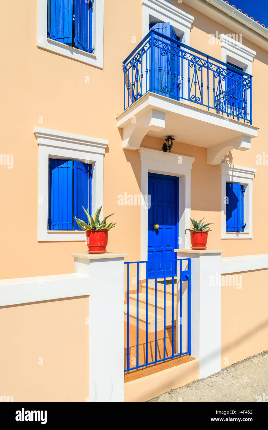 Facade of typical Greek house built in Venetian style in Assos town ...
