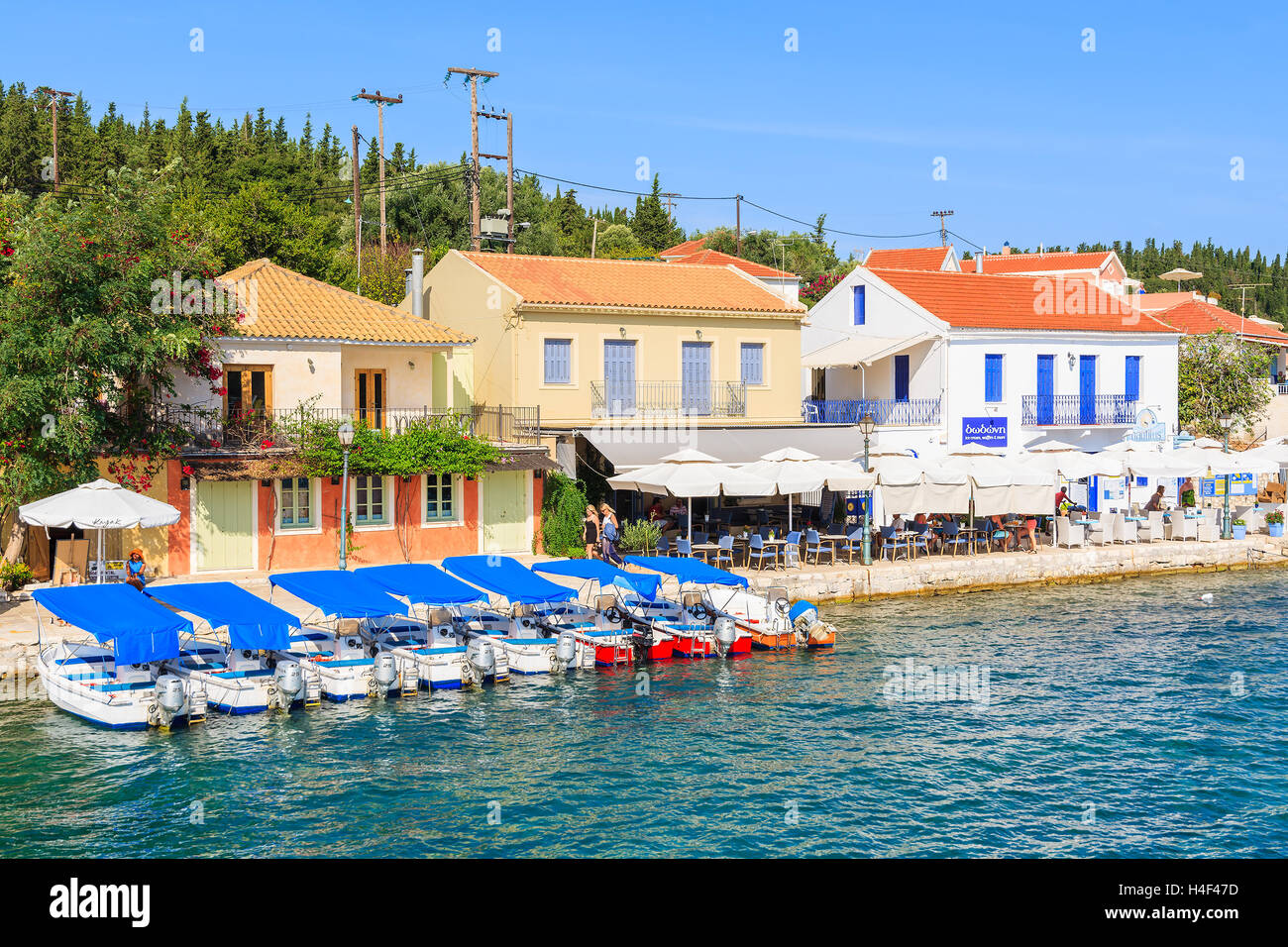 FISKARDO PORT, KEFALONIA ISLAND, GREECE - SEP 19, 2014: small boats in ...