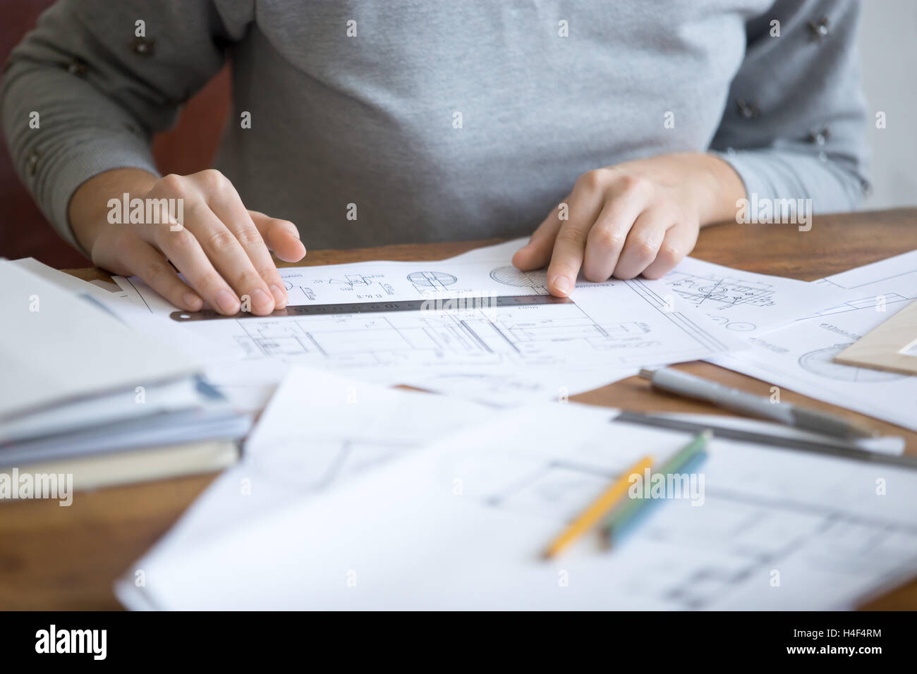 Female hands, working with a ruler and a drawing Stock Photo - Alamy