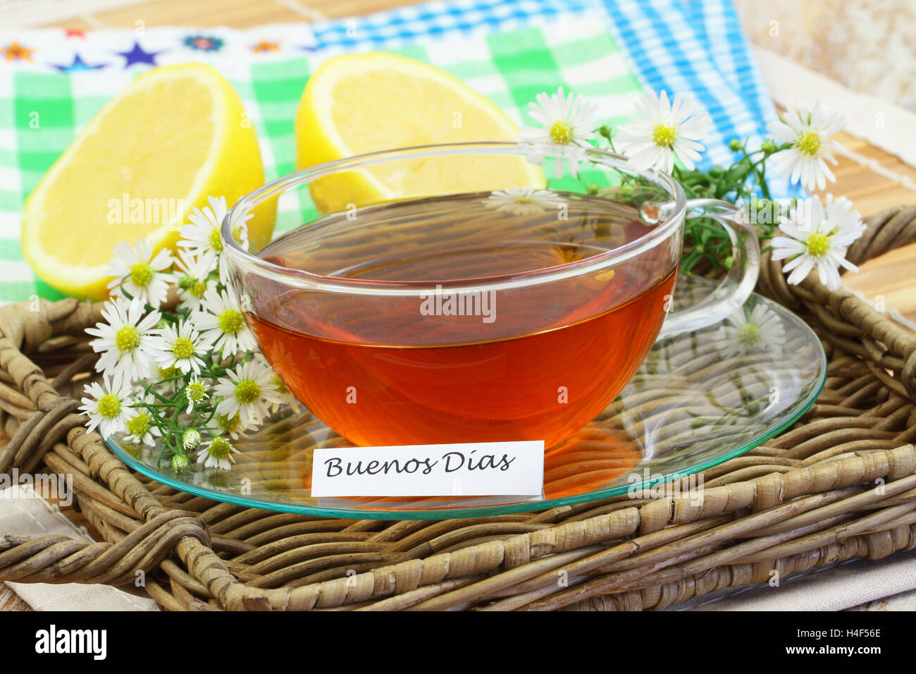 Buenos dias (Good morning in Spanish) with cup of chamomile tea and ...