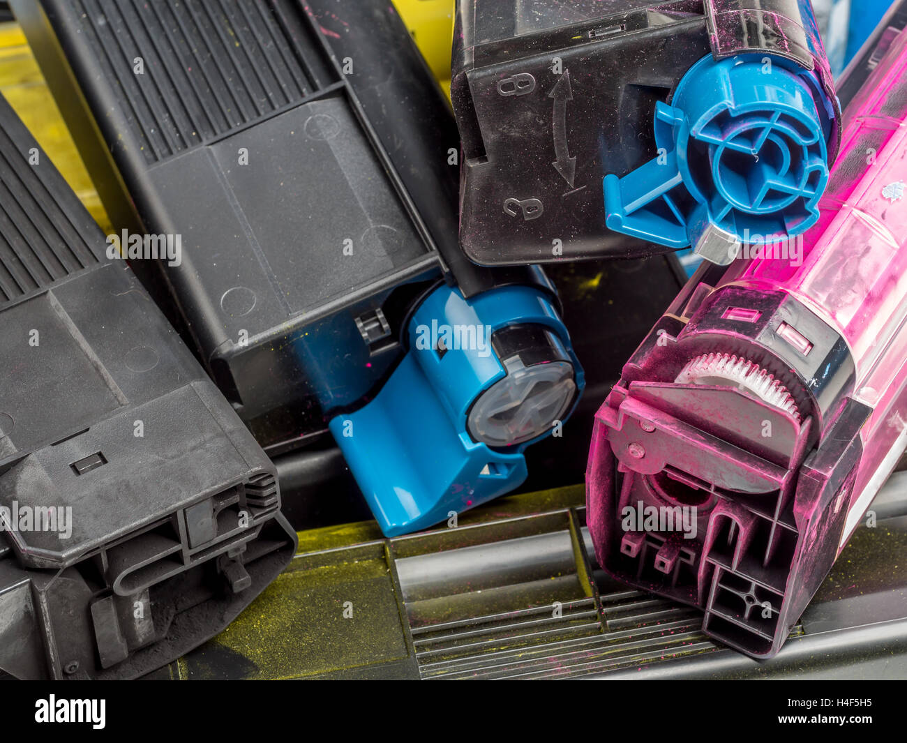 Pile of used color laser printer toner cartridges Stock Photo - Alamy