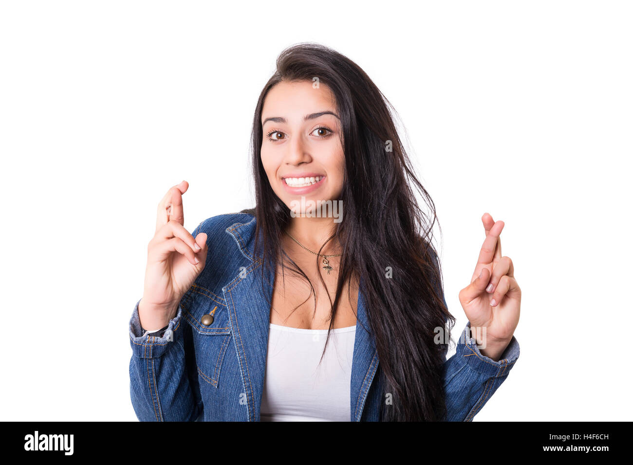 Woman with crossed fingers, isolated over a white background Stock ...