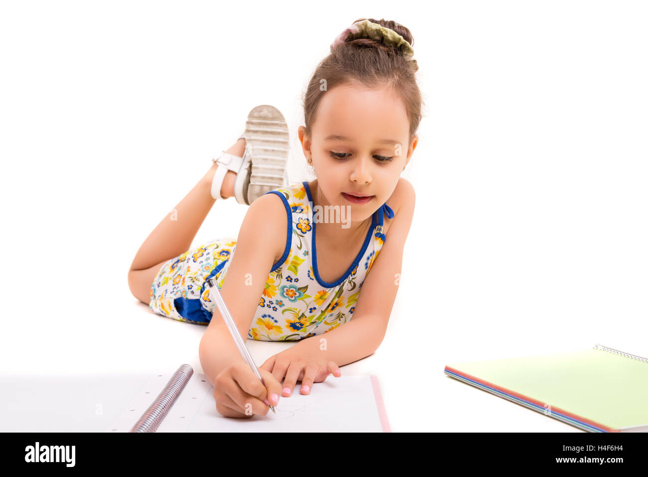 Young girl making some draws - isolated over white Stock Photo - Alamy