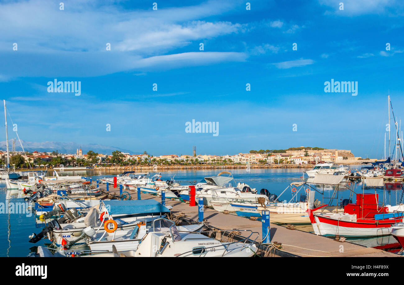 The motor boats and yachts in the new port with the medieval Fortezza ...