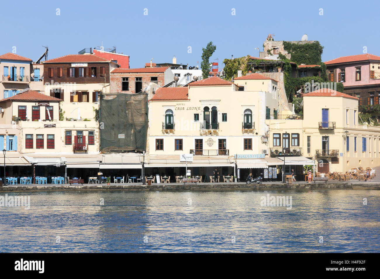 Waterfront restaurant by the old Venetian harbour in Chania, Crete ...