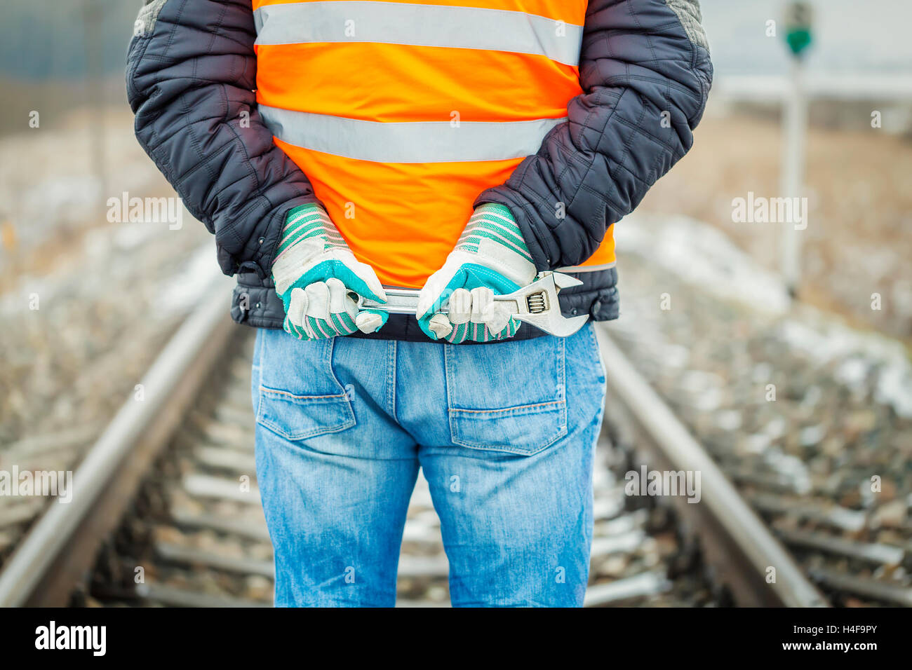 Worker hands with adjustable wrench on the railroad Stock Photo - Alamy