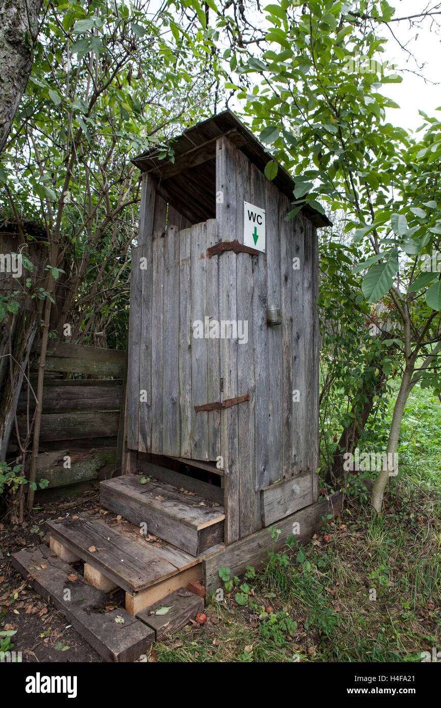 Rudimentary wooden toilet hut Stock Photo - Alamy