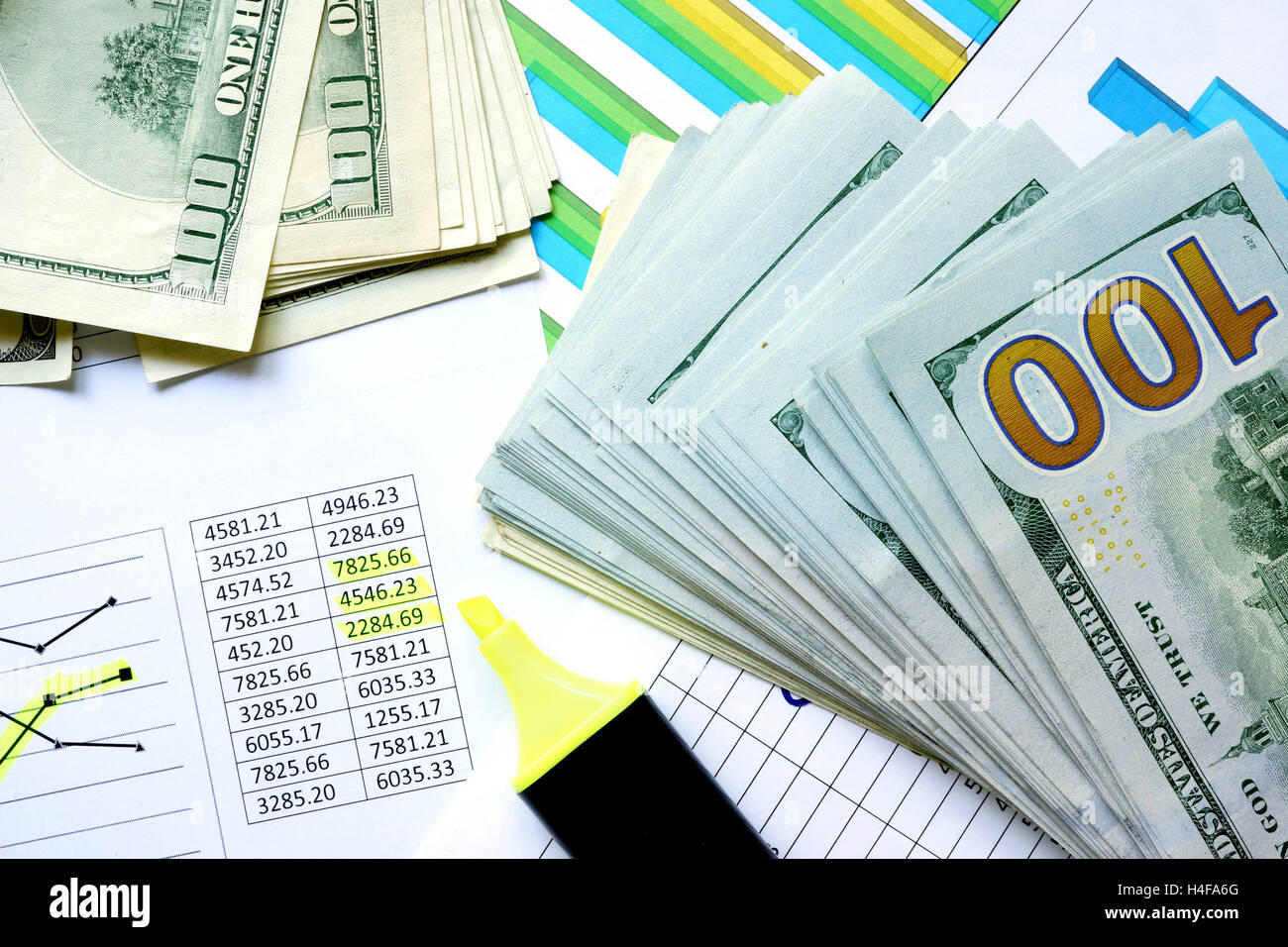 Money with colorful charts and marker. Finance concept Stock Photo - Alamy