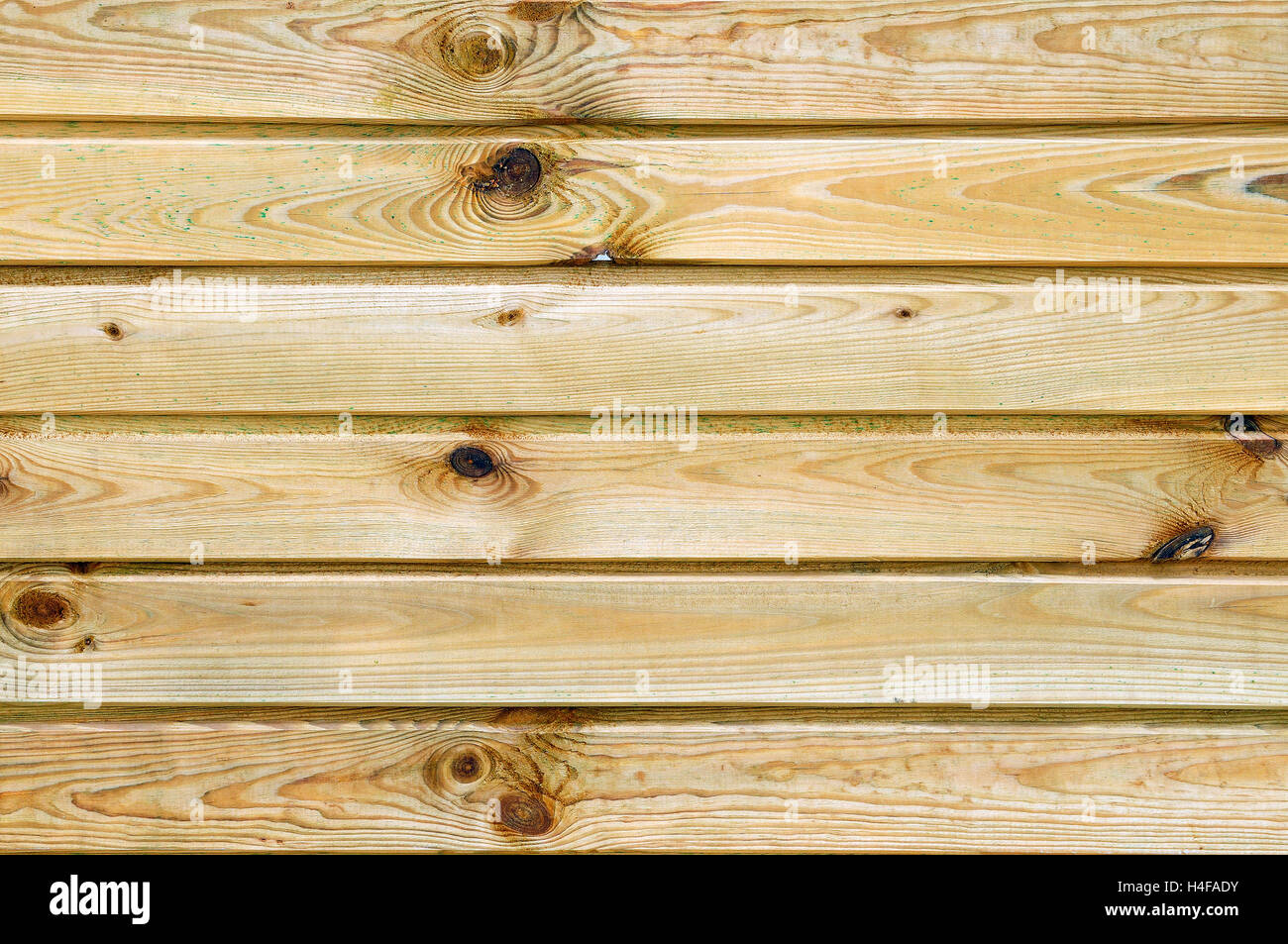 Closeup of a rustic wall built with natural wood planks Stock Photo - Alamy