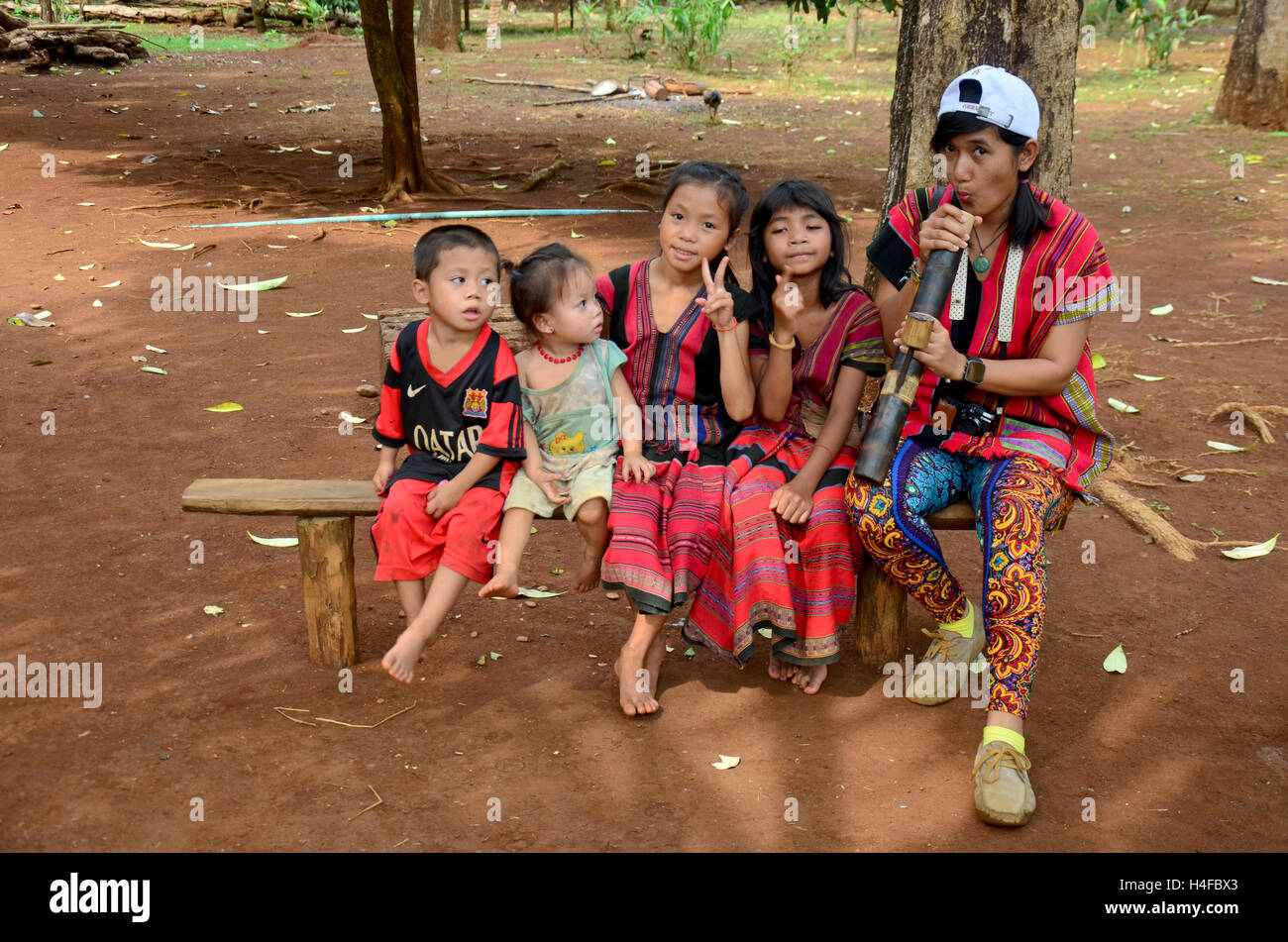Children wear costume ethnic for show and take photo with traveler at ...