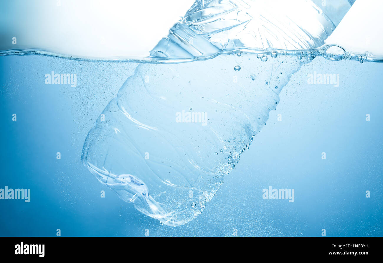 Bottle in under clean drinking water Stock Photo - Alamy
