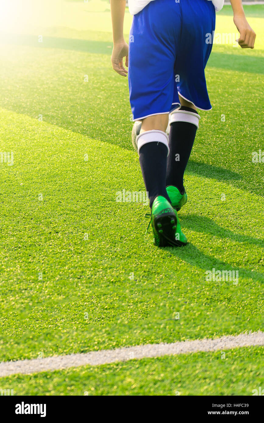 Soccer player ready to play at kick off the game in soccer field ...