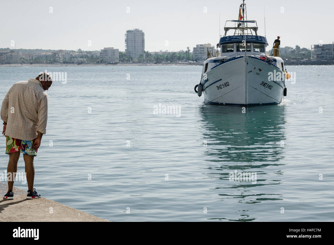 View of a fishing boat in Altea port, Alicante north, Spain Stock Photo ...