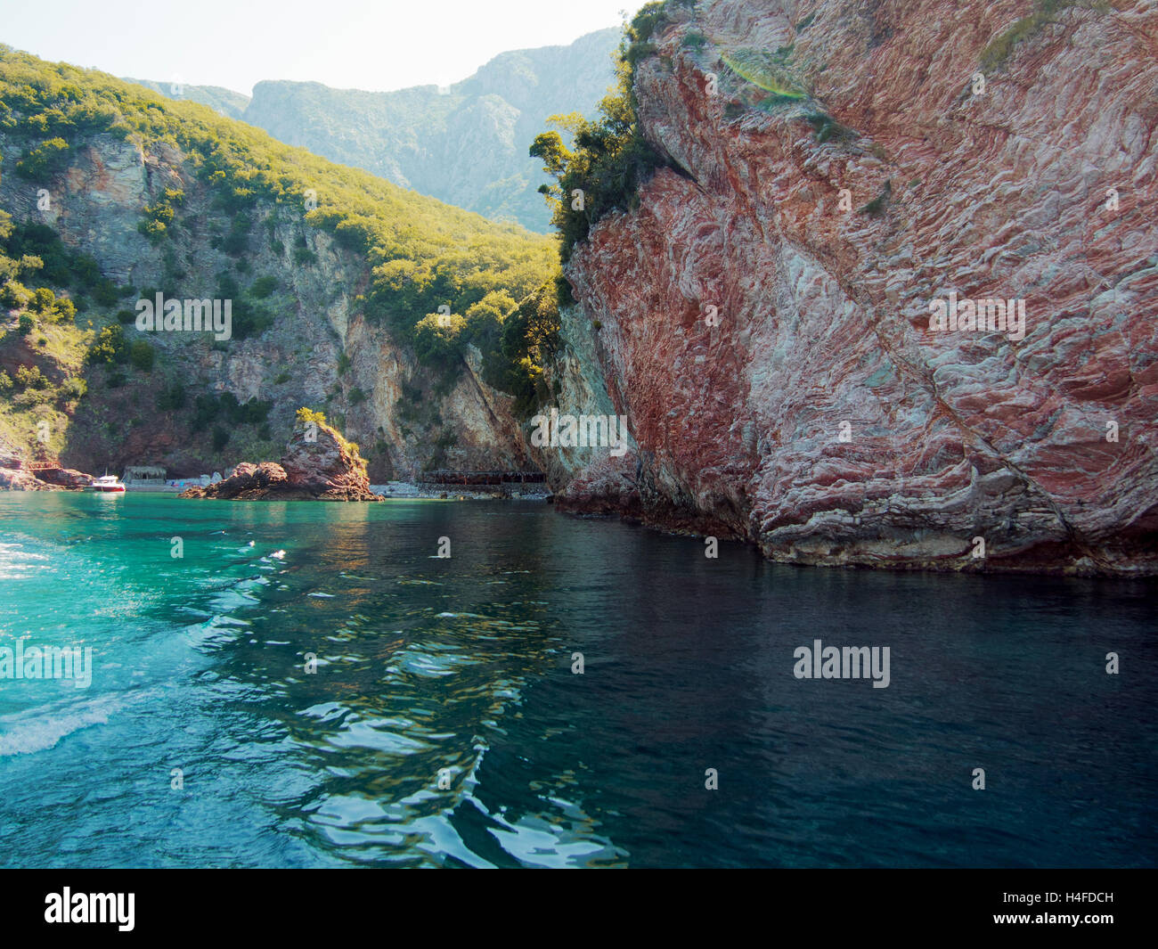 Beautiful seascape, view of beach. Clean sea water and mountains ...