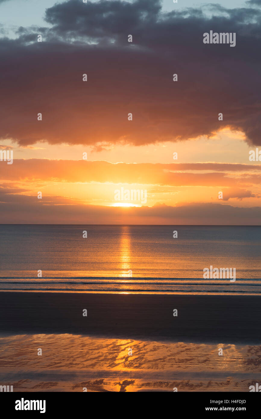 Sunset over the British coast, Britain, UK Stock Photo - Alamy