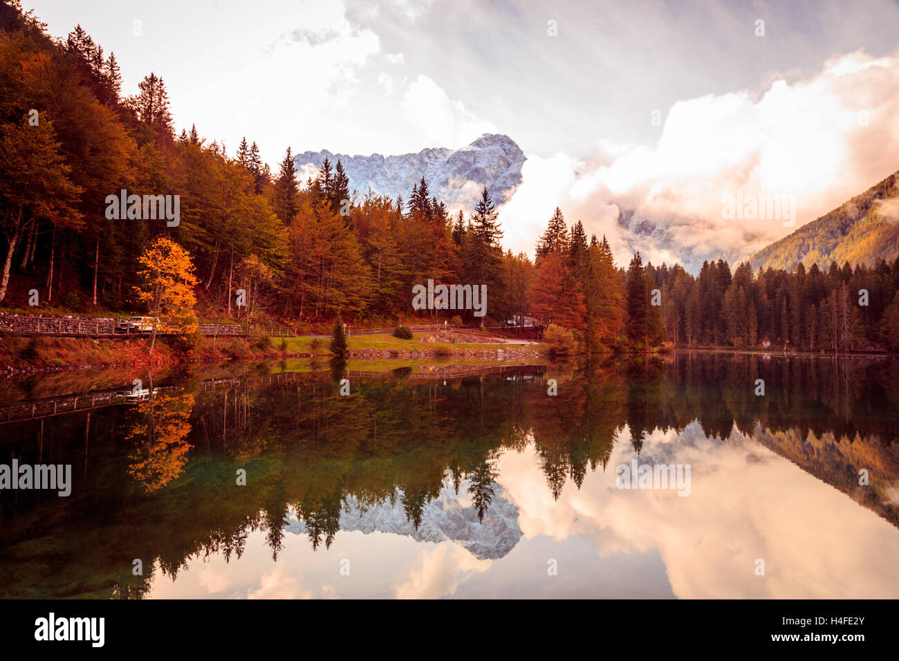 Fall in the italian alps in a misty day Stock Photo - Alamy