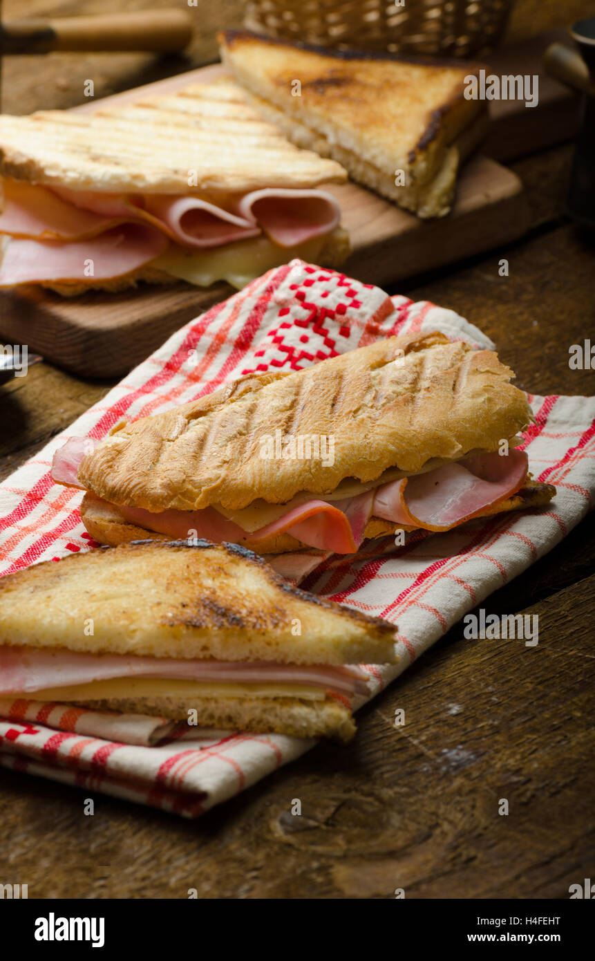Quick dinner, toast with ham and cheese - panini, english toast, french ...