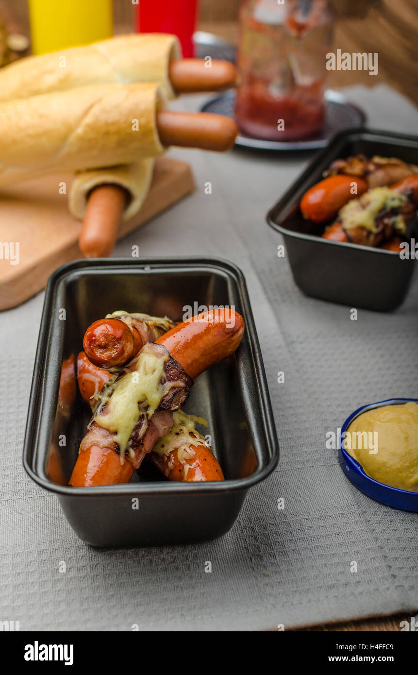 Fried sausage in a robe of bacon and cheese, hot dog, czech Stock Photo ...