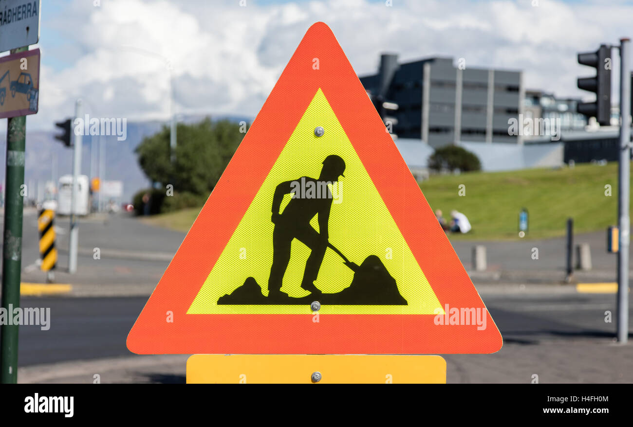 Roadworks sign, bright yellow and red - Iceland Stock Photo - Alamy