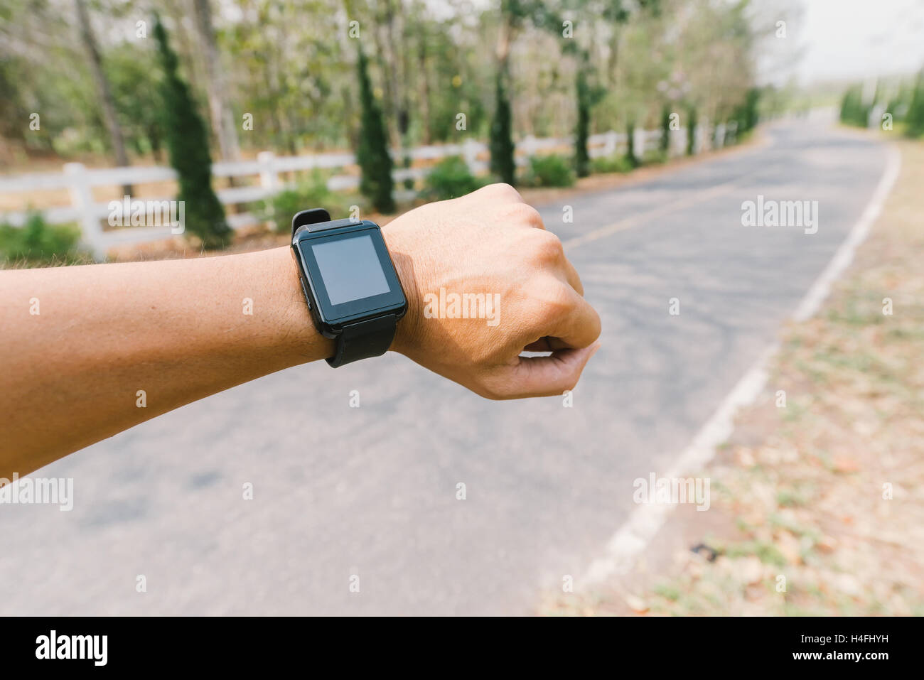 Close-up smart watch on arm traveller using GPS, navigation concept ...