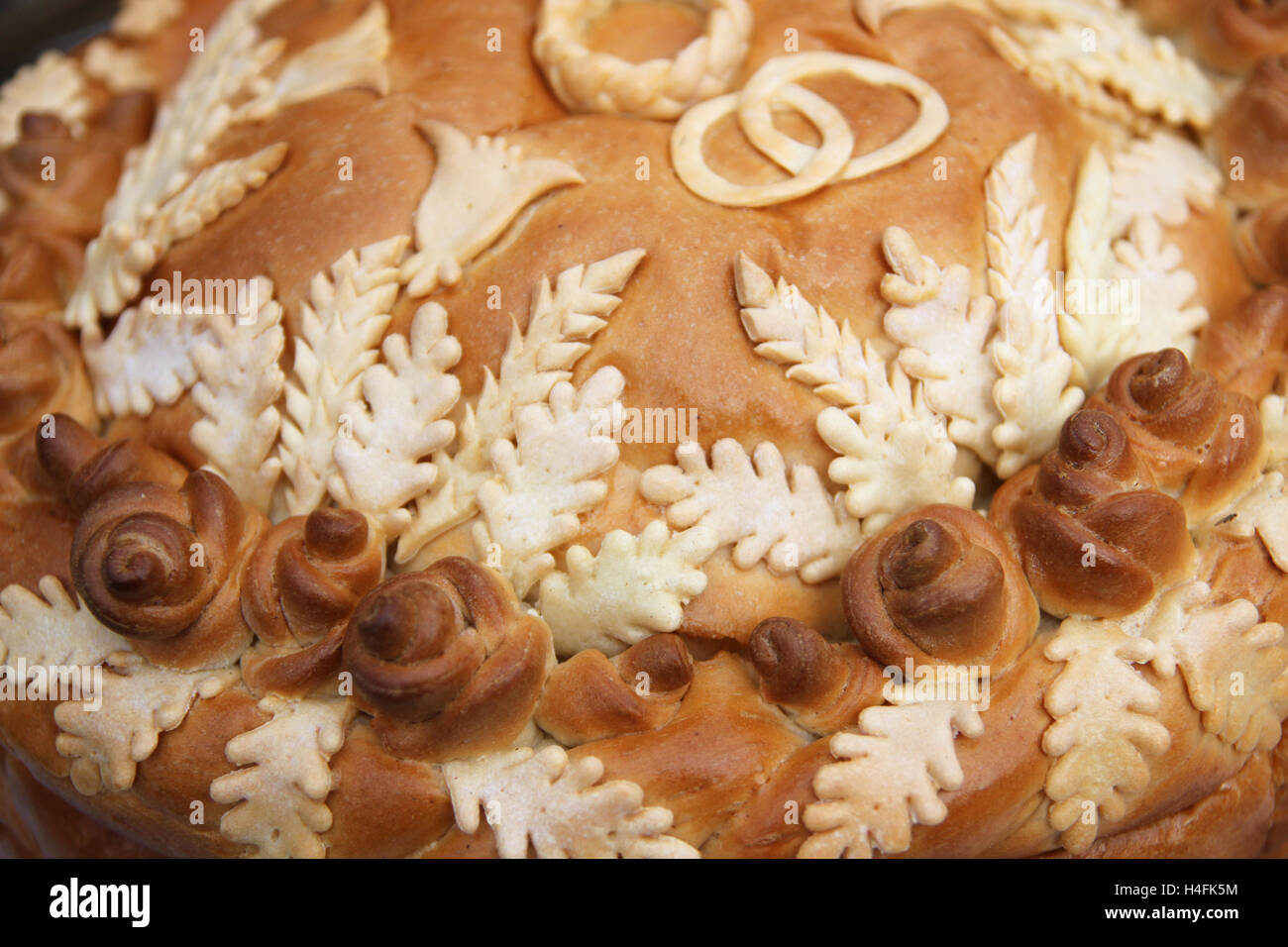 Round Bread decorated with flowers, grape and leaves from dough Stock ...