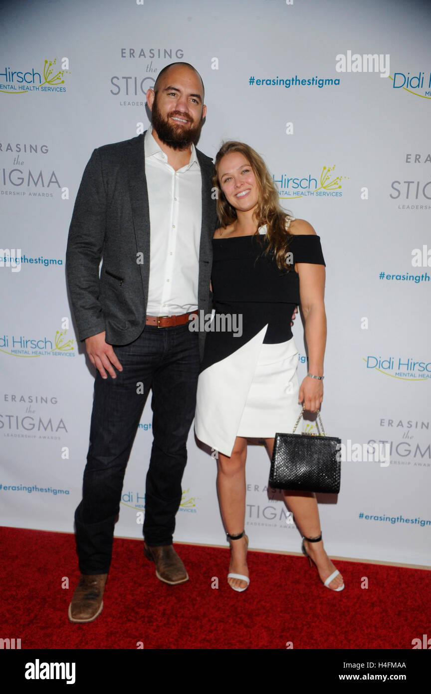 Ronda Rousey and Travis Browne arrives at the 20th Anniversary Erasing ...