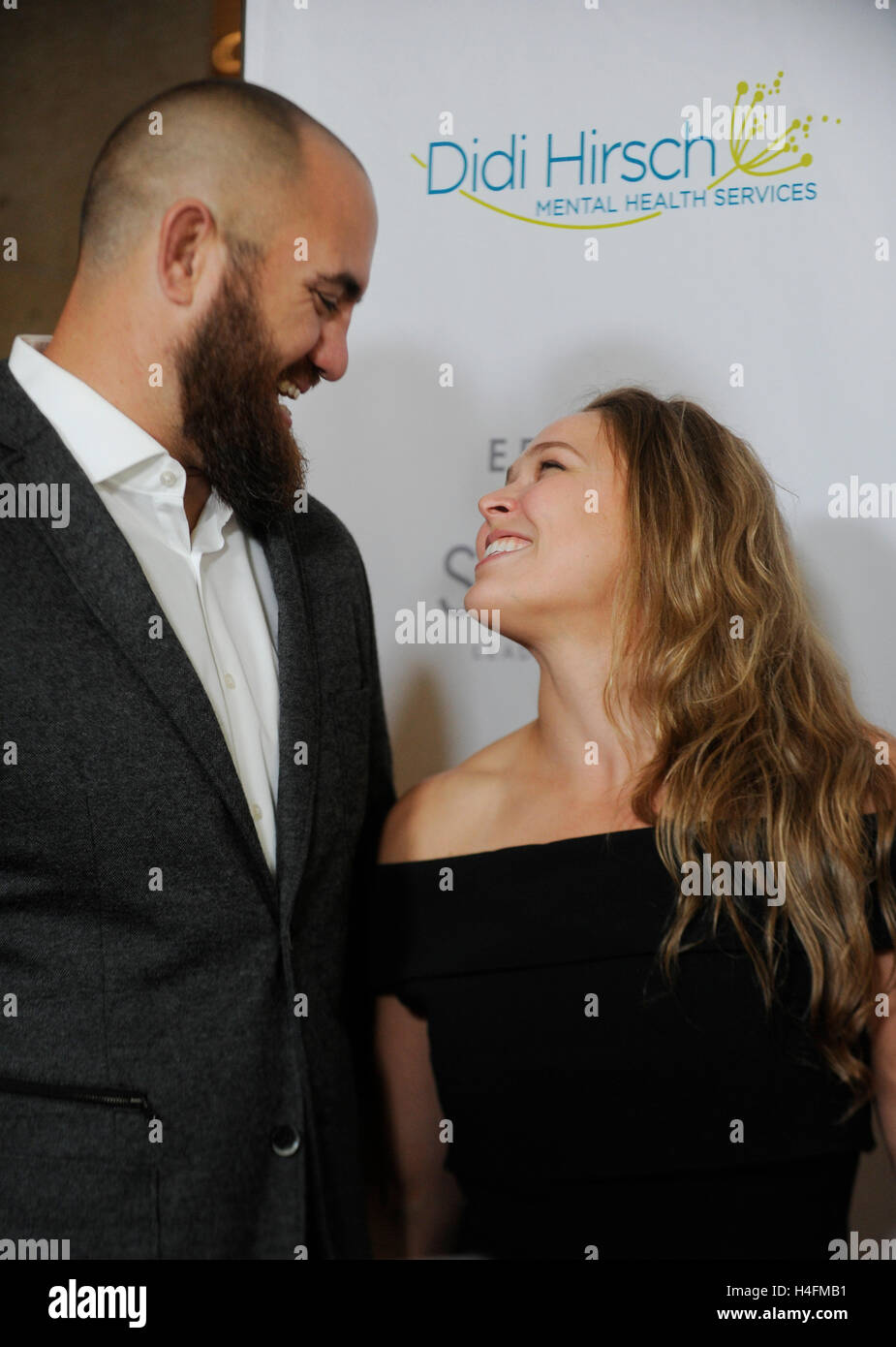 Ronda Rousey and Travis Browne arrives at the 20th Anniversary Erasing ...